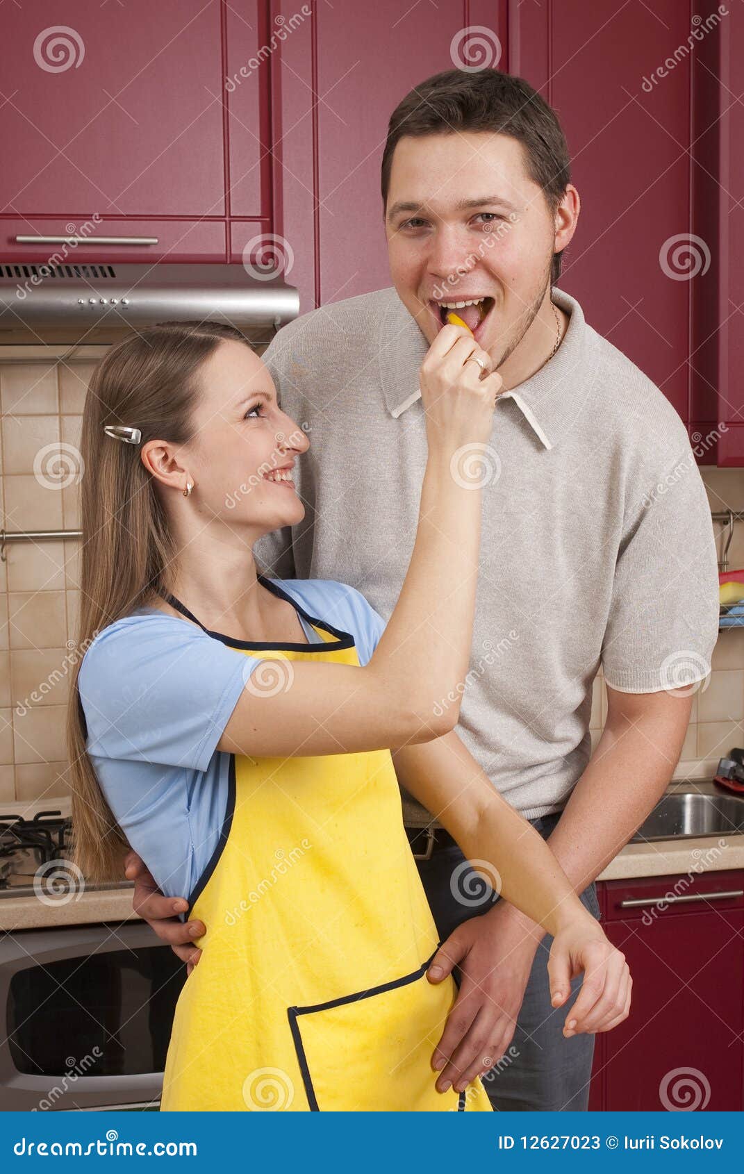 Happy Couple in Their Kitchen Stock Image - Image of domestic ...