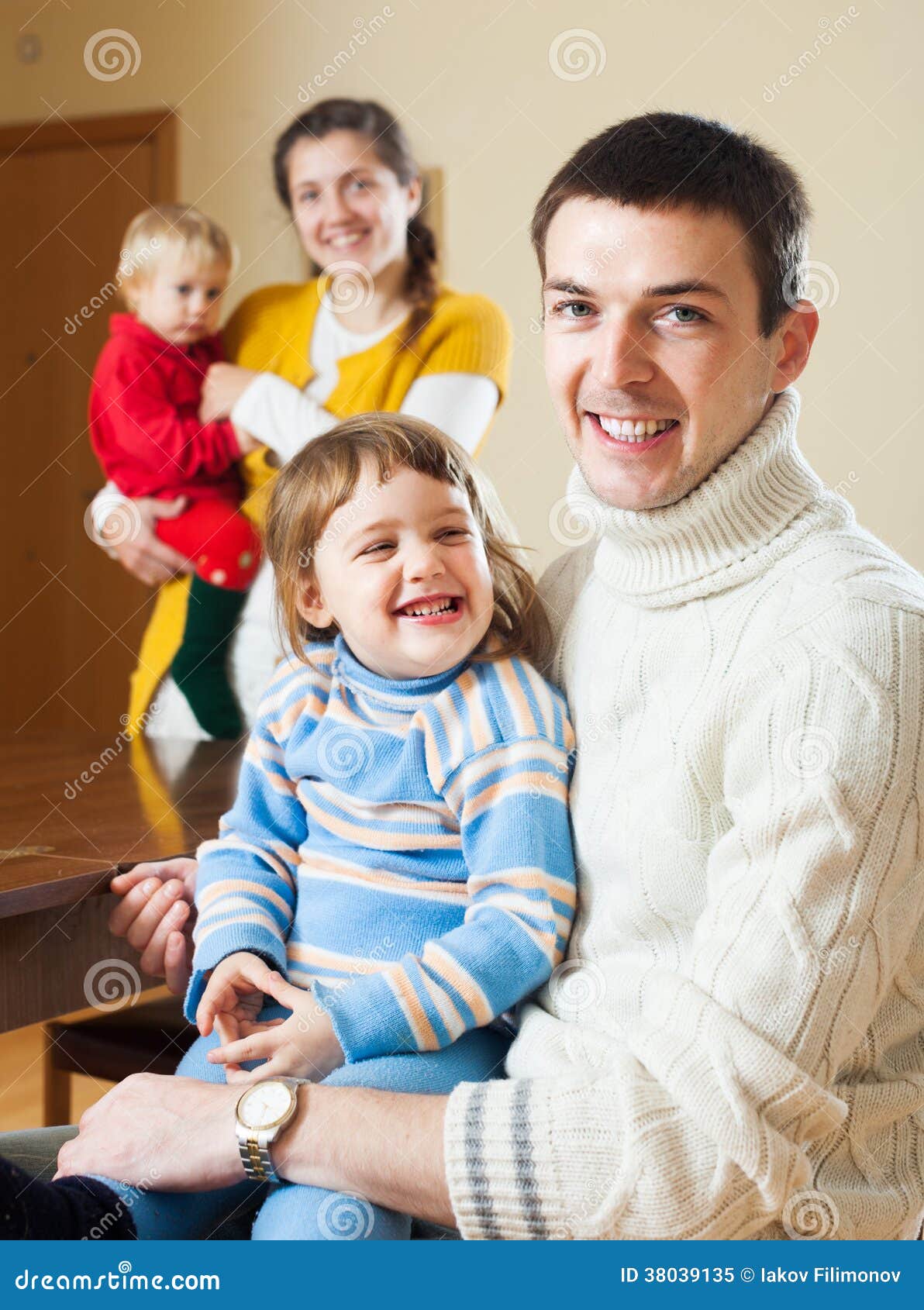 Happy Couple with Two Children Stock Image - Image of cheerful, smile ...