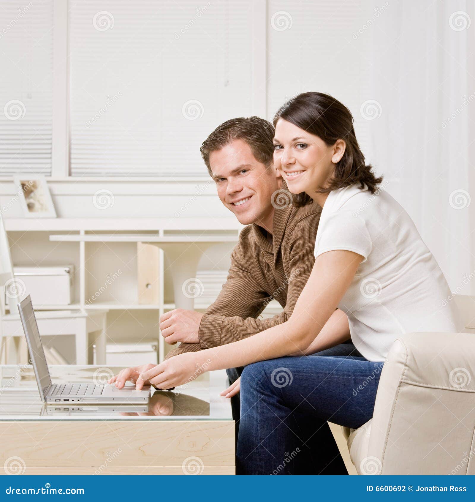 Happy Couple Typing on Laptop Stock Photo - Image of adult, person: 6600692