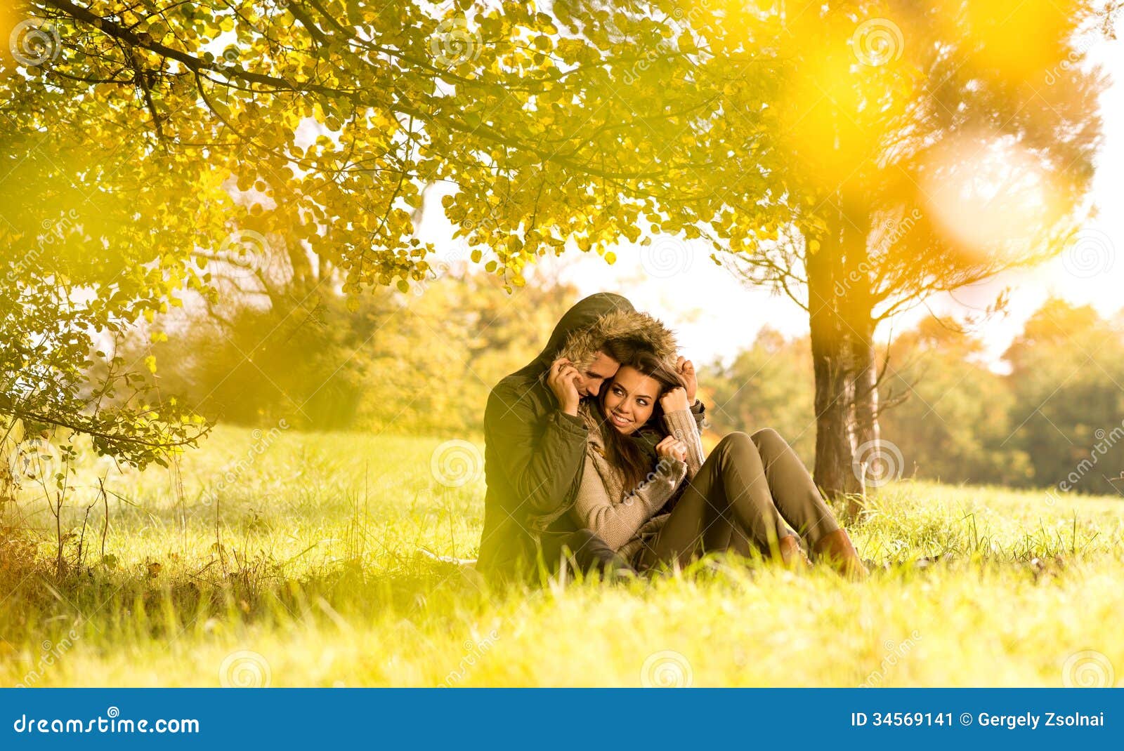 Happy Couple Under the Tree Stock Image - Image of handsome, outdoor ...