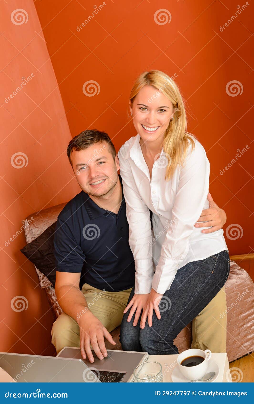 Happy Couple Using Laptop Computer Sitting Together Stock Image Image