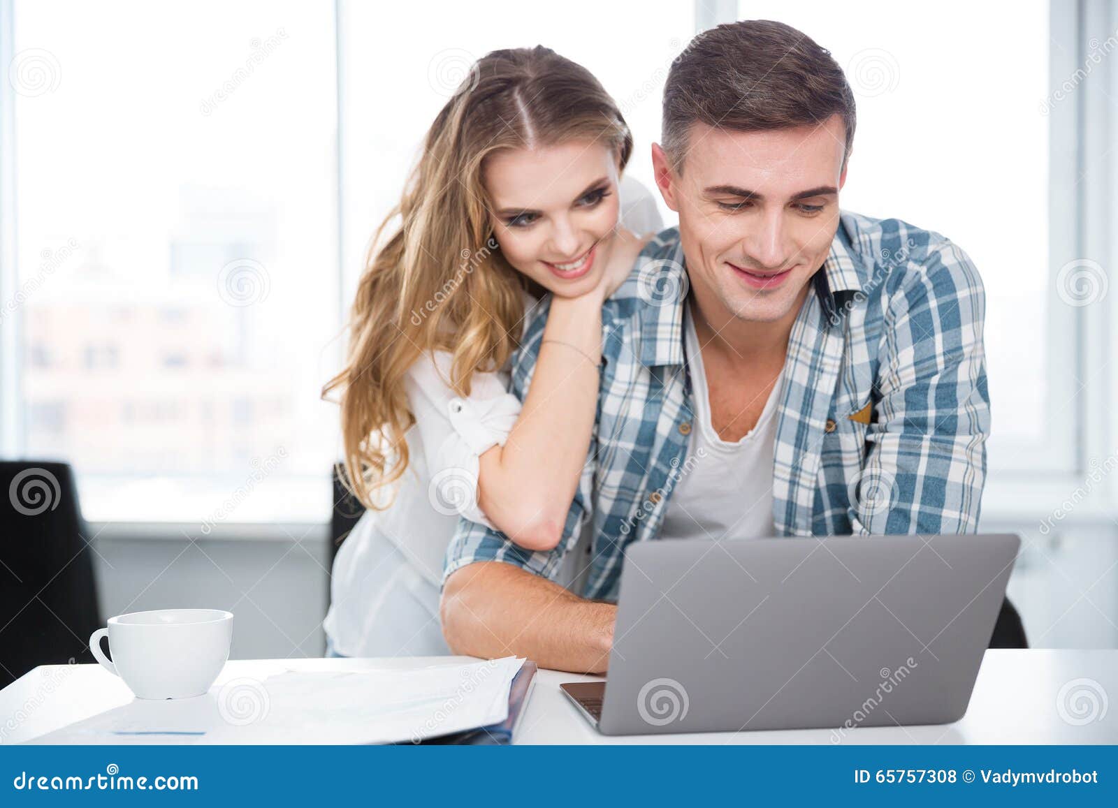 Happy Couple Using Laptop and Surfing in Internet Stock Photo - Image ...