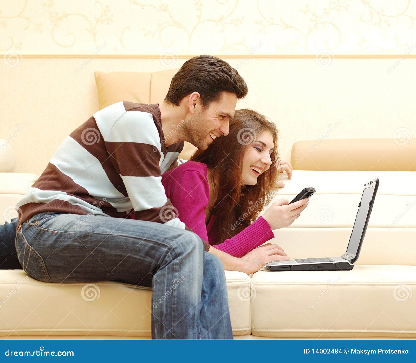 Happy Couple Working on Laptop Stock Photo - Image of house, people ...