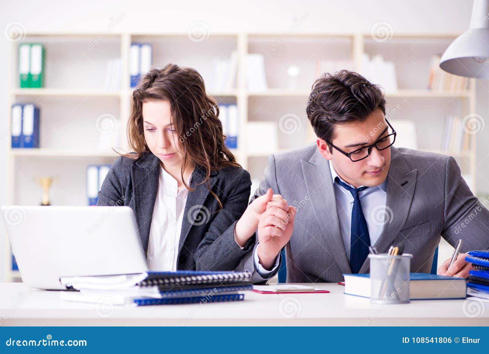 The Happy Couple Working in the Same Office Stock Photo - Image of ...