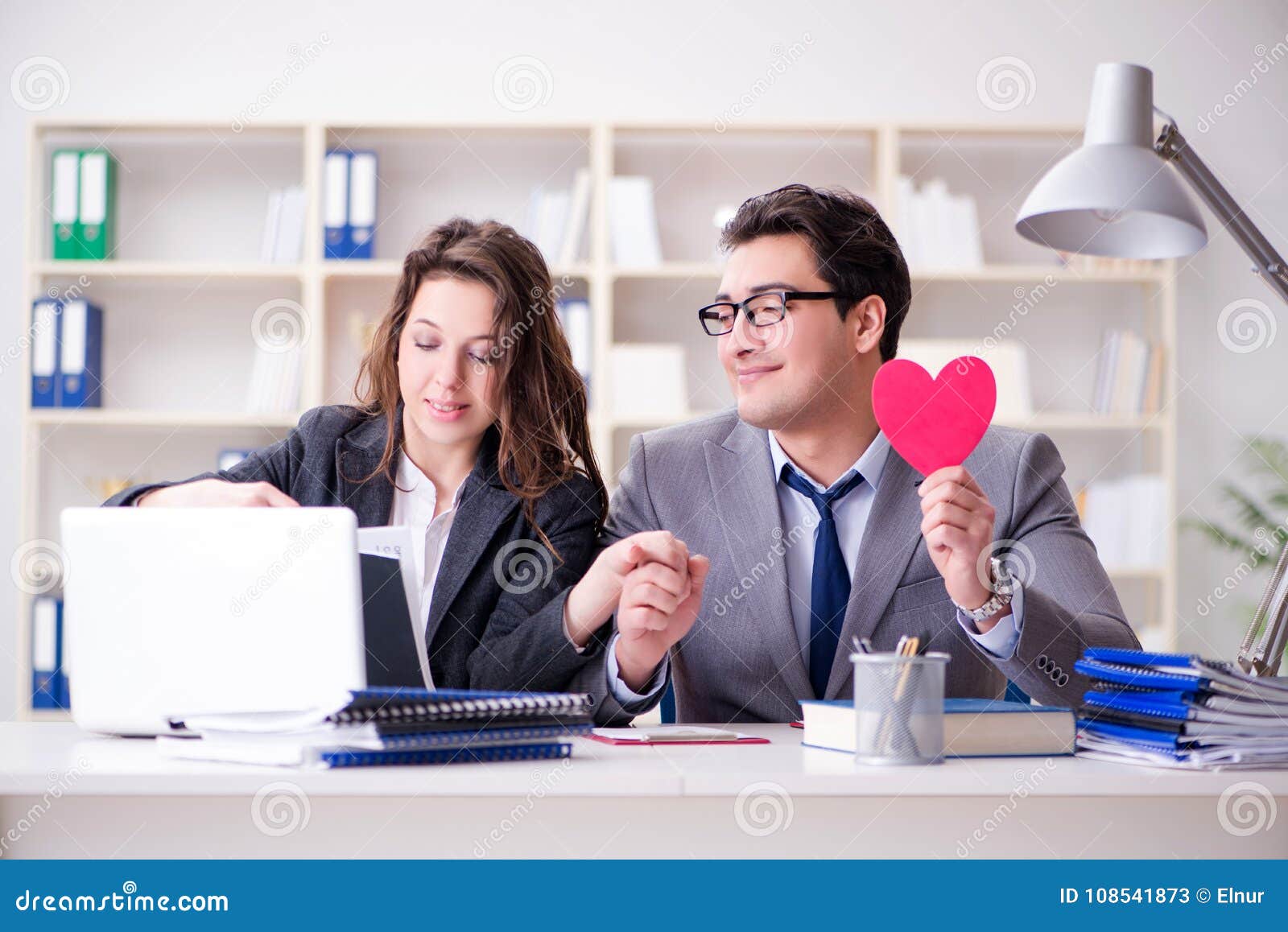 The Happy Couple Working in the Same Office Stock Image - Image of ...