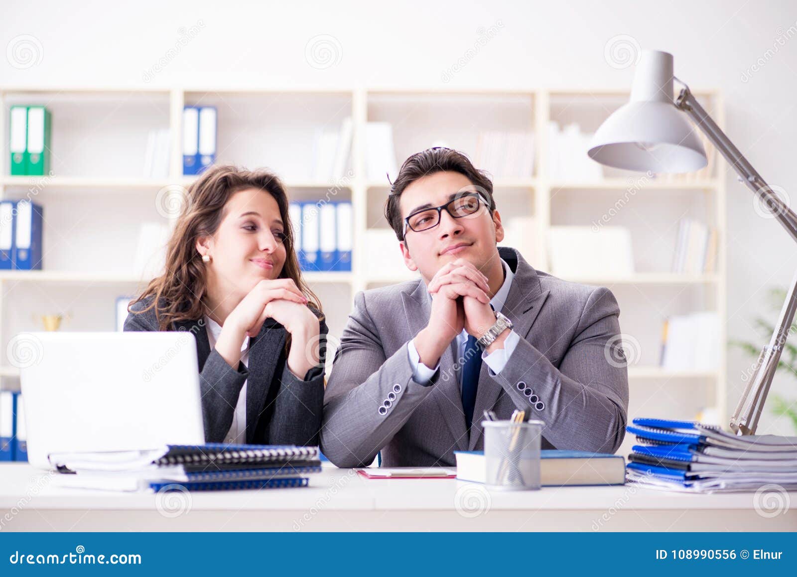 The Happy Couple Working in the Same Office Stock Photo - Image of ...