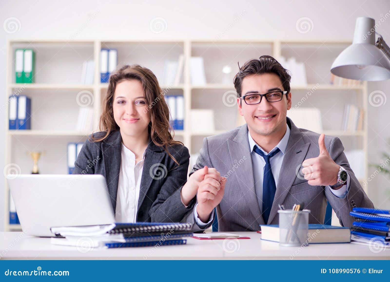 The Happy Couple Working in the Same Office Stock Photo - Image of ...