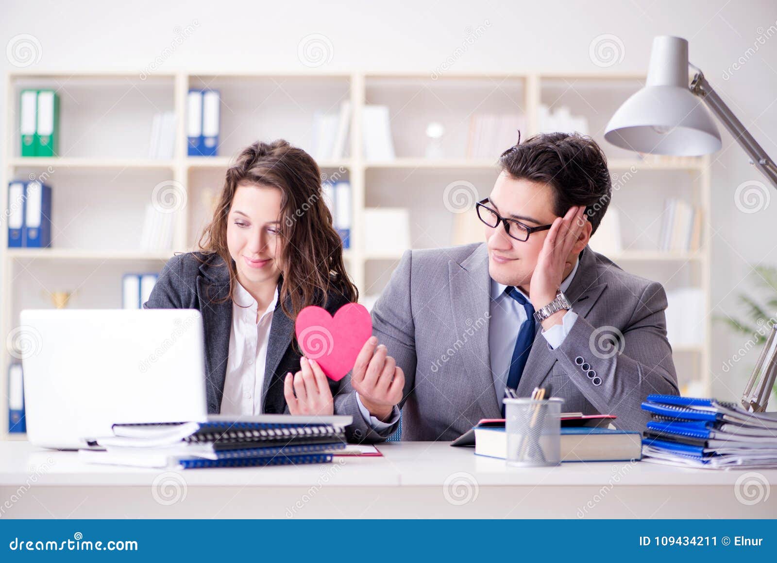 The Happy Couple Working in the Same Office Stock Image - Image of ...