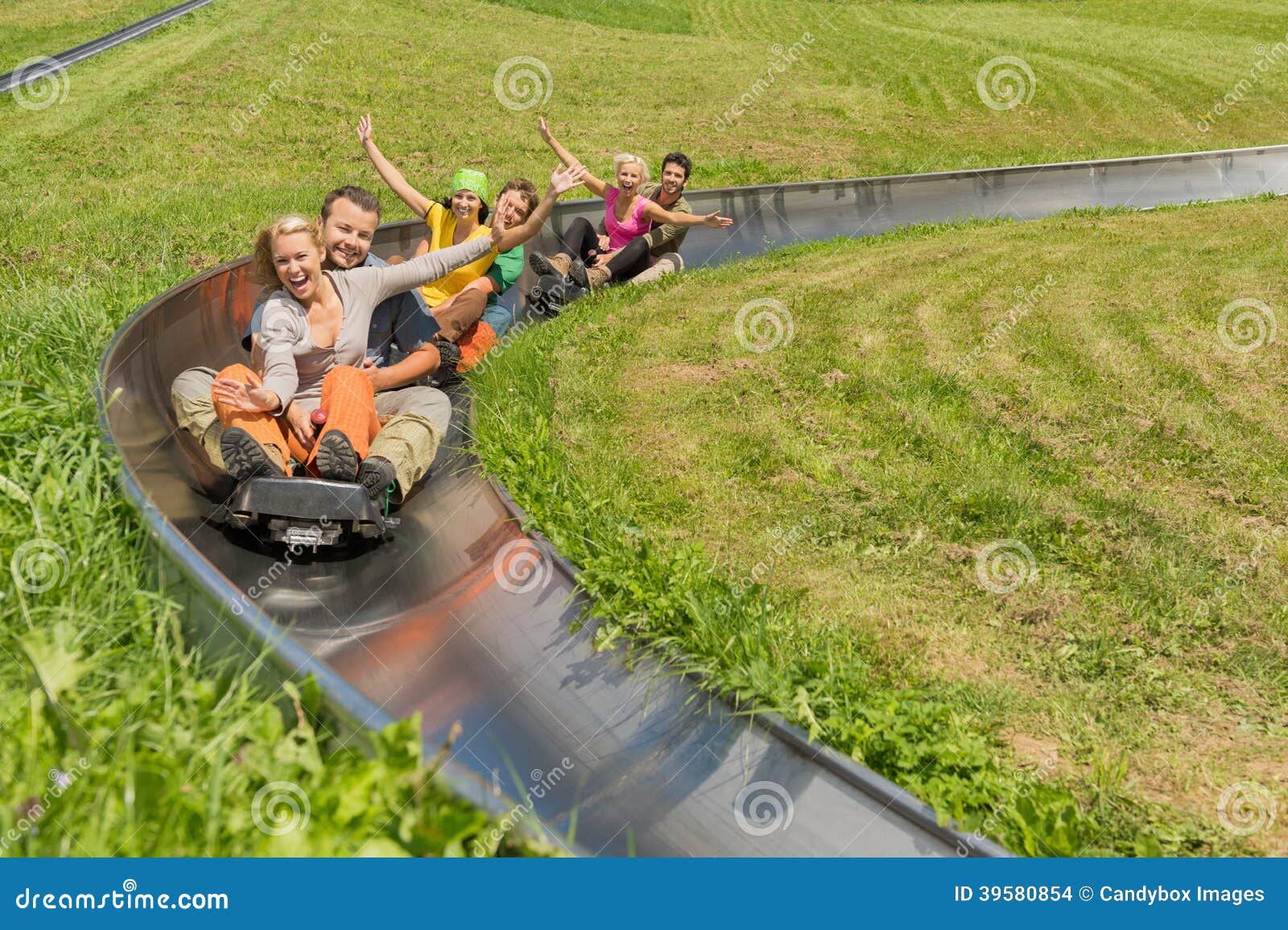 Happy Couples Enjoying Summer Sledge Stock Photo - Image of alpine ...