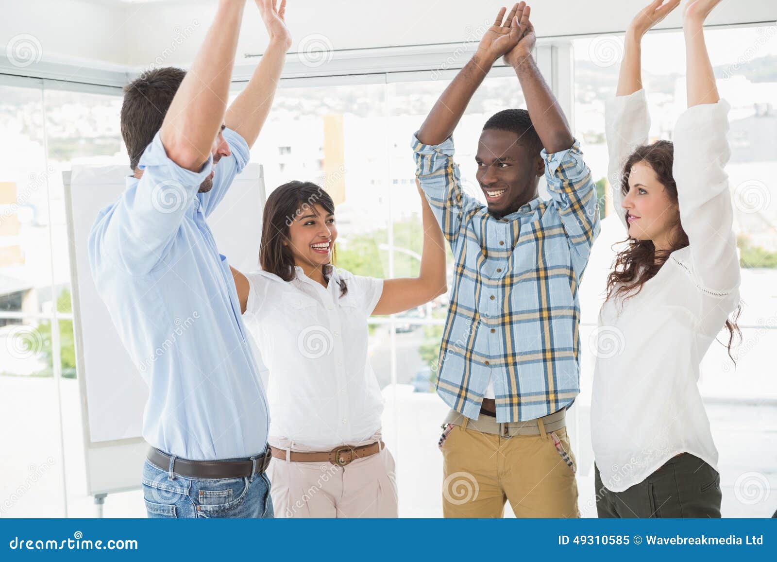 Happy Coworkers Standing and Cheering Together Stock Image - Image of ...