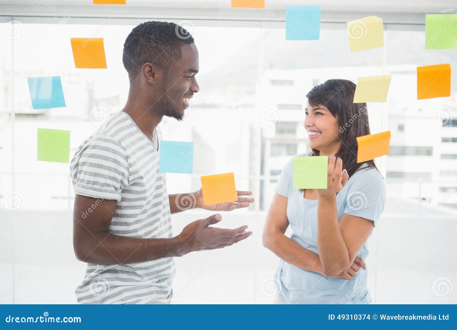 Happy Coworkers Standing and Interacting Together Stock Photo - Image ...