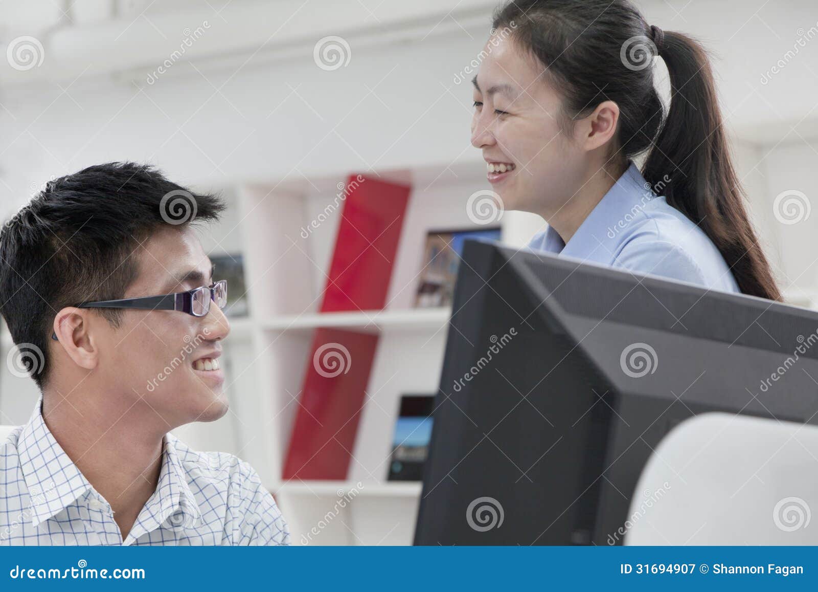 Happy Coworkers Working on Their Computer in the Office Stock Image ...
