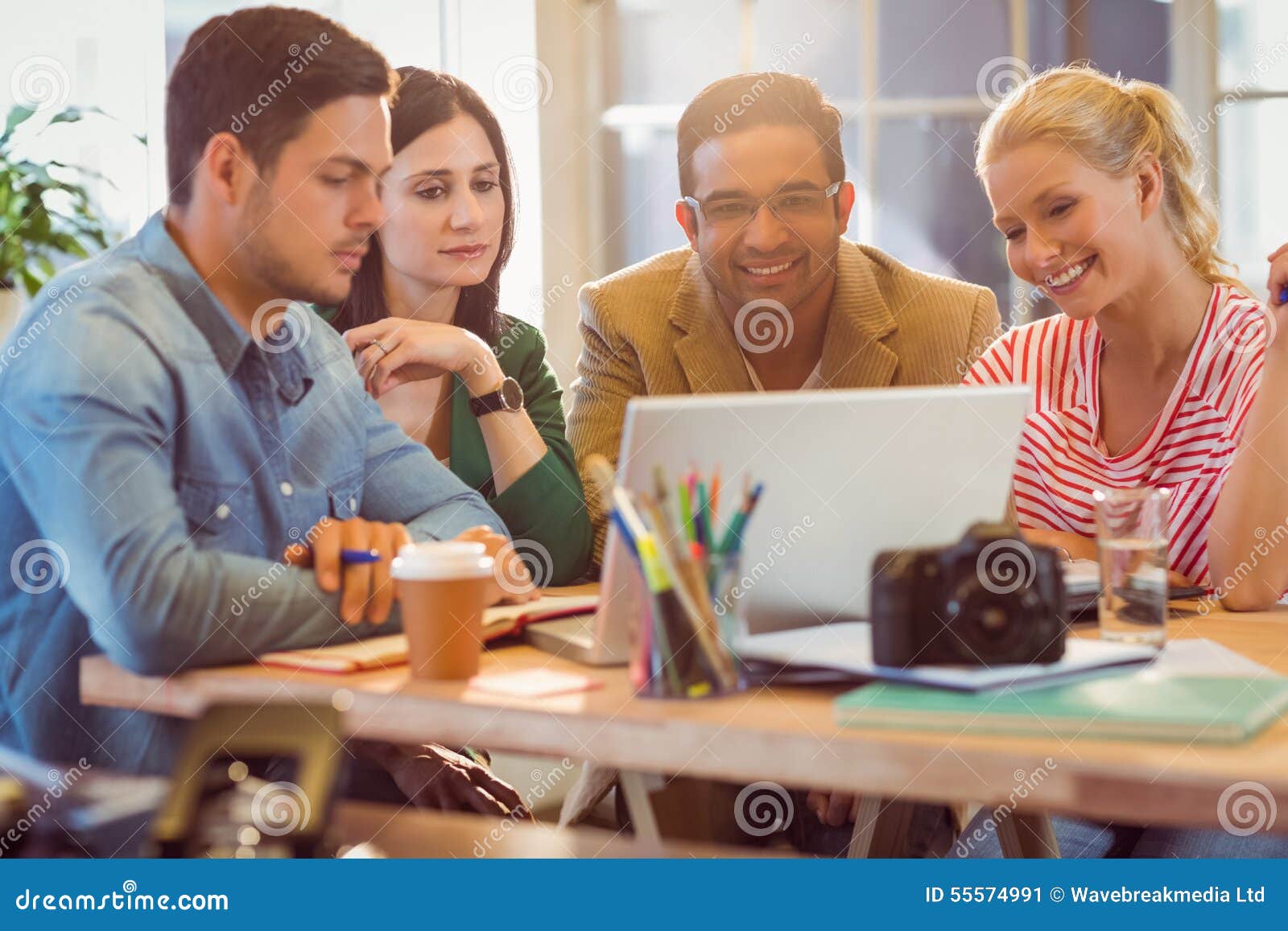 Happy Creative Business Team Using Laptop in Meeting Stock Image ...