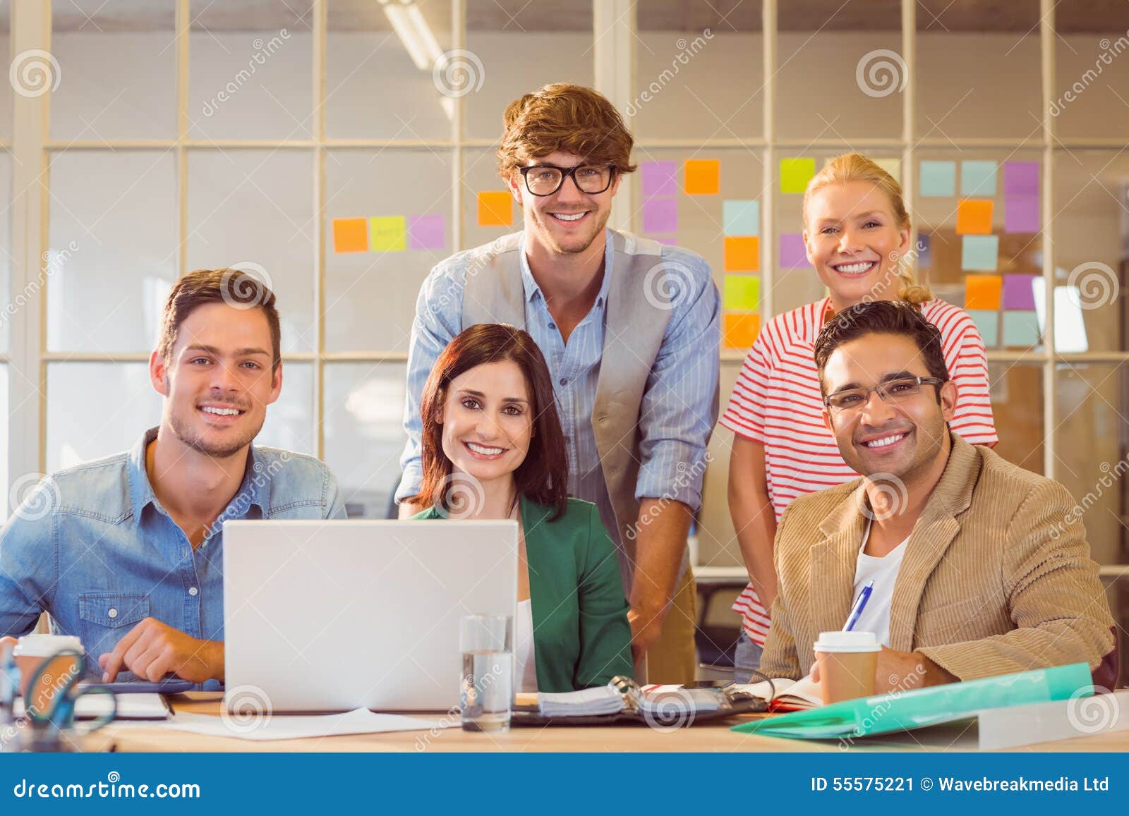 Happy Creative Business Team Using Laptop in Meeting Stock Image ...