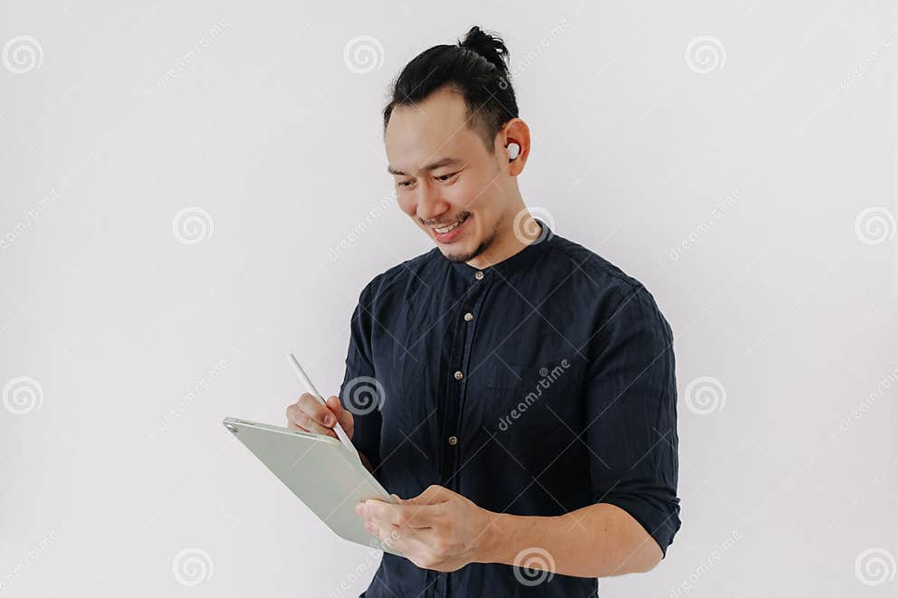 Happy Creative Freelance Man with Earbuds Work with Tablet Isolate on ...