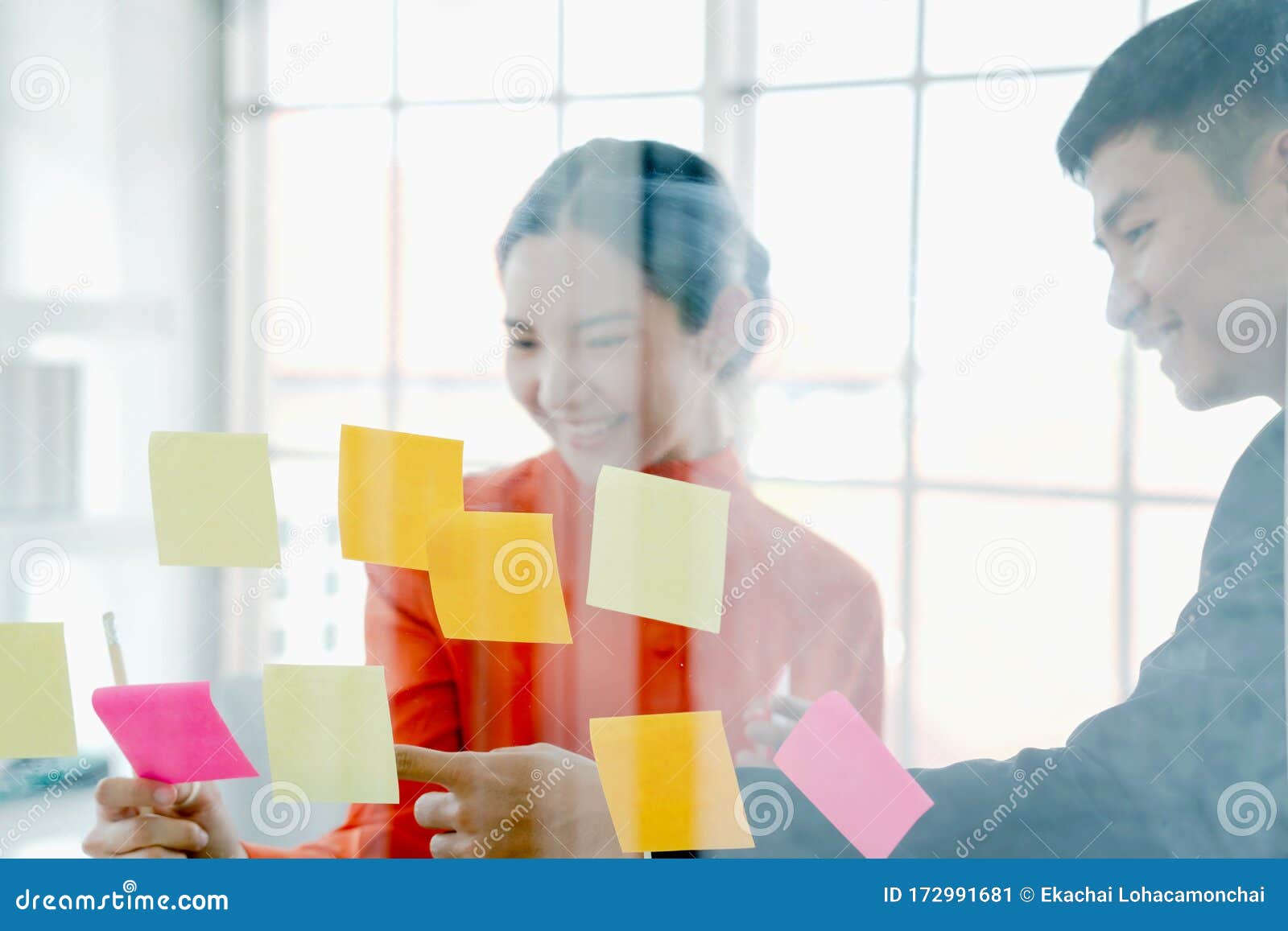 Creative People Making Mind Map on a Glass Wall in the Office Stock ...
