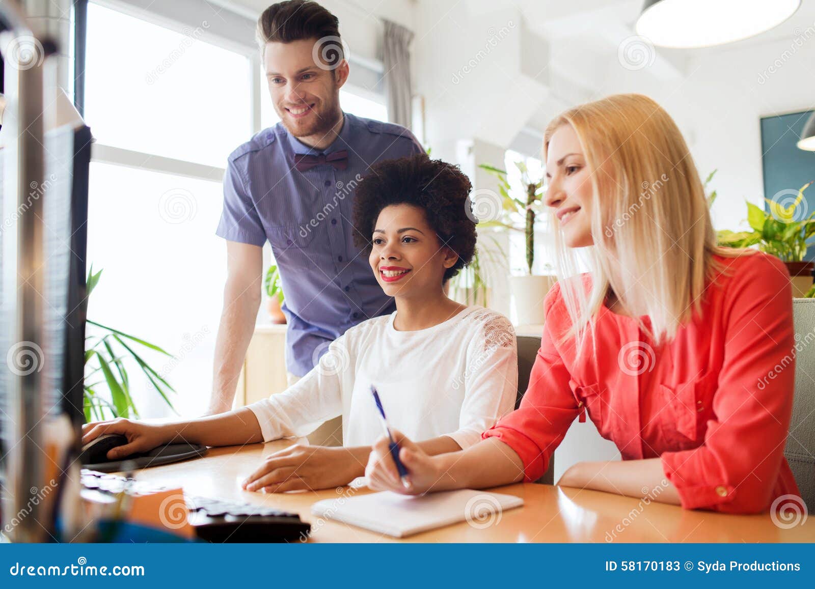 Happy Creative Team with Computer in Office Stock Image - Image of ...