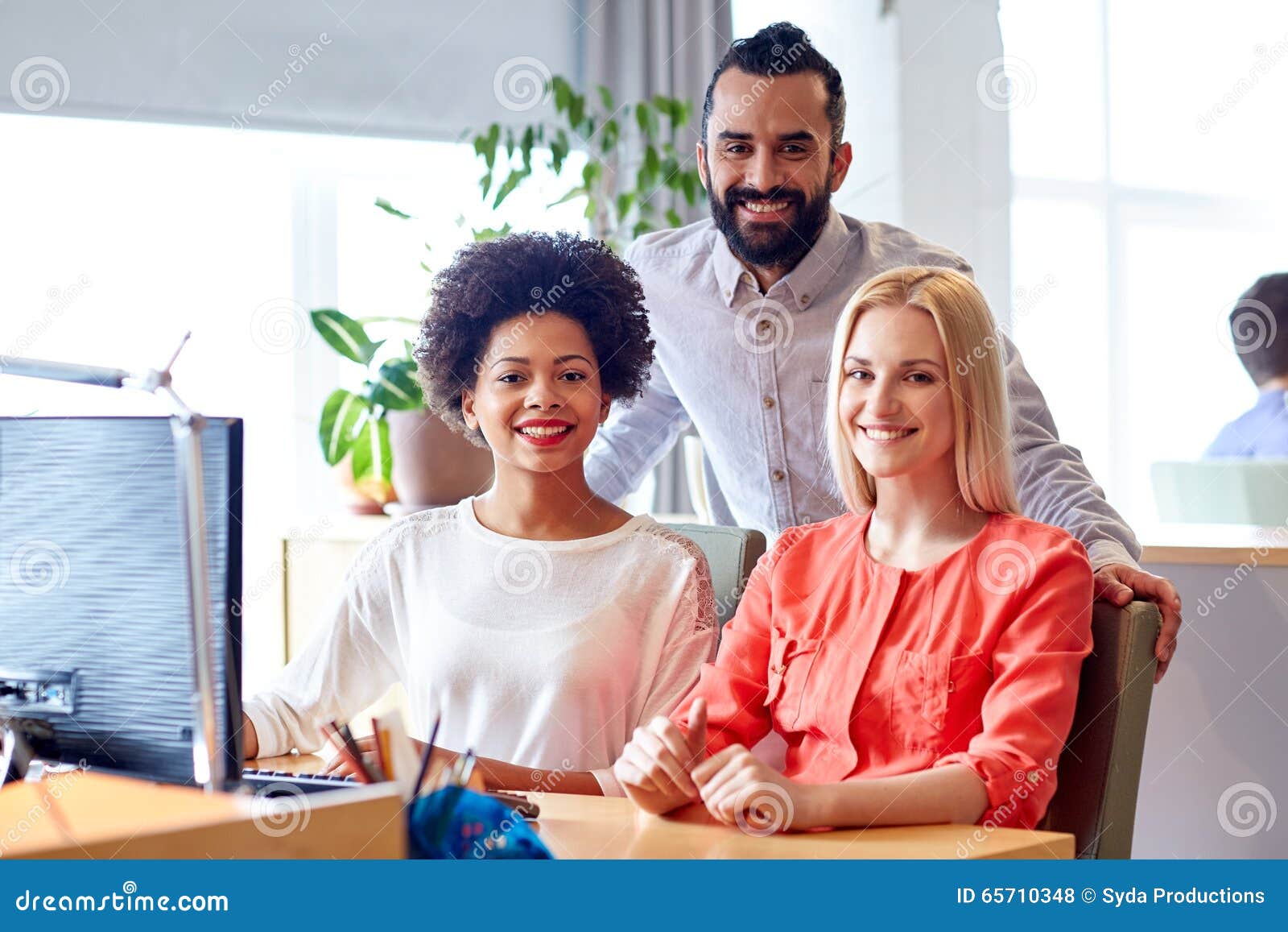 Happy Creative Team with Computer in Office Stock Photo - Image of afro ...