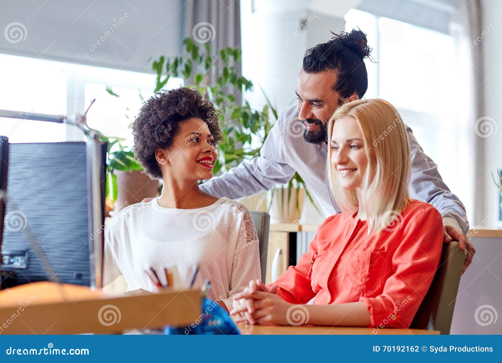 Happy Creative Team with Computer in Office Stock Photo - Image of ...