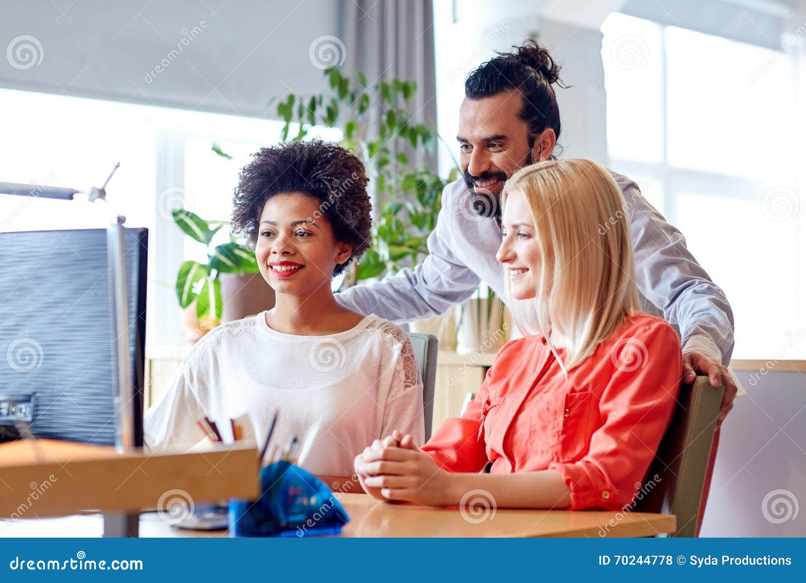 Happy Creative Team With Computer In Office Stock Photo - Image of ...