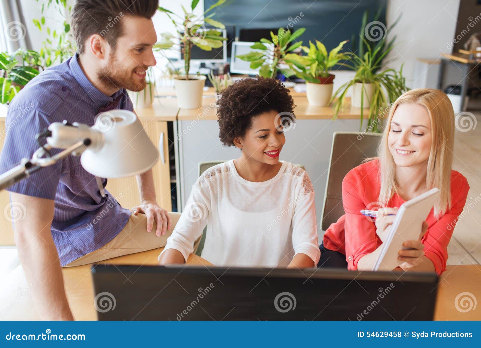 Happy Creative Team with Computer in Office Stock Photo - Image of ...