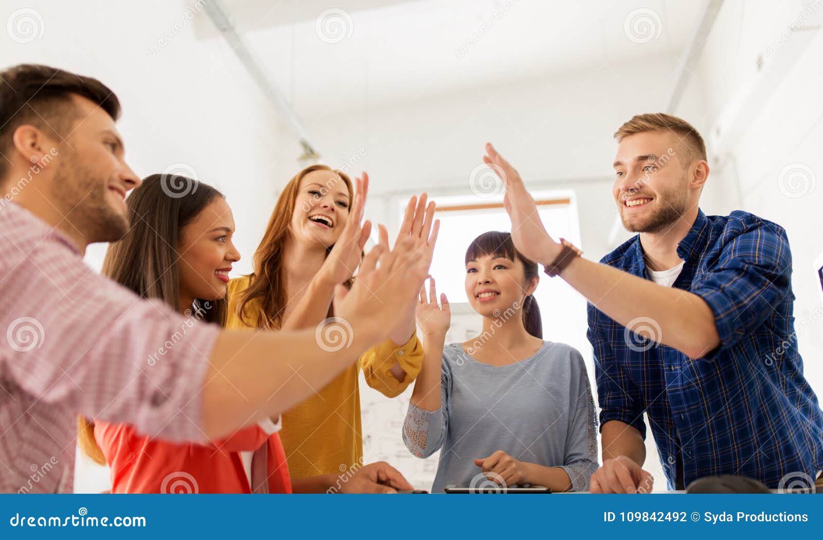 Happy Creative Team Making High Five at Office Stock Photo - Image of ...