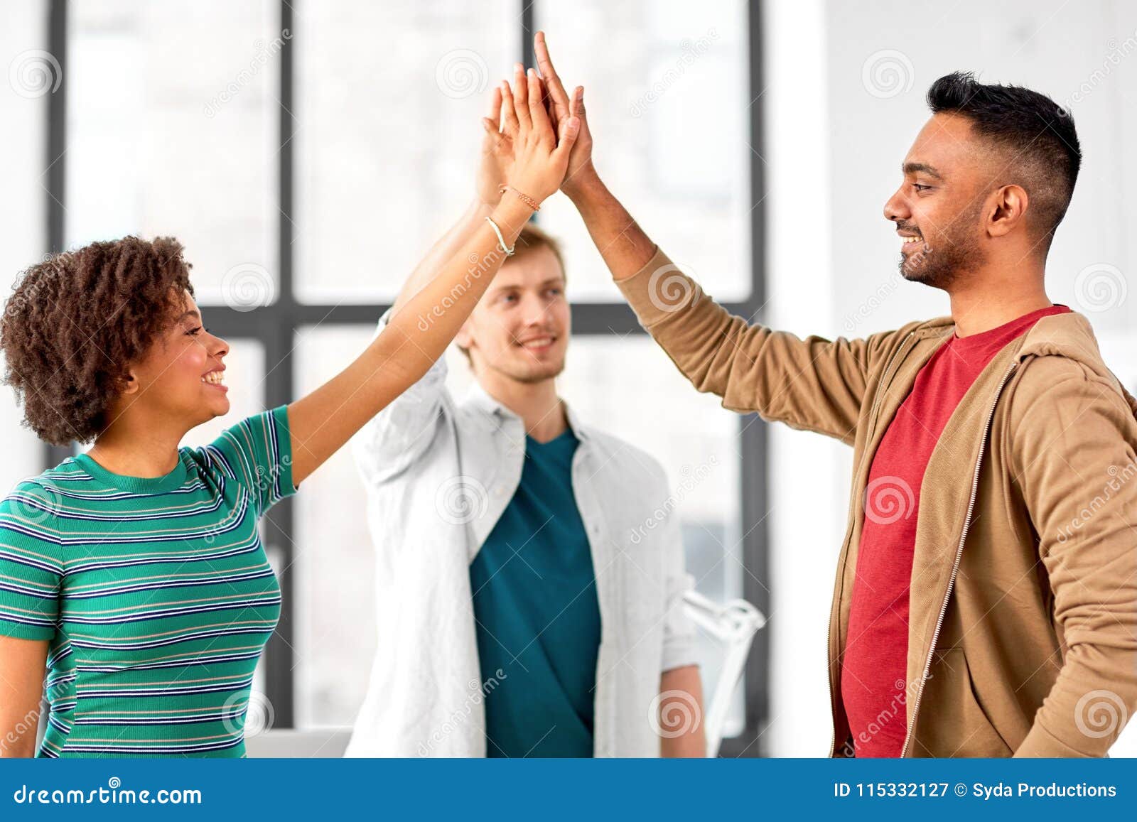 Happy Creative Team Making High Five at Office Stock Image - Image of ...