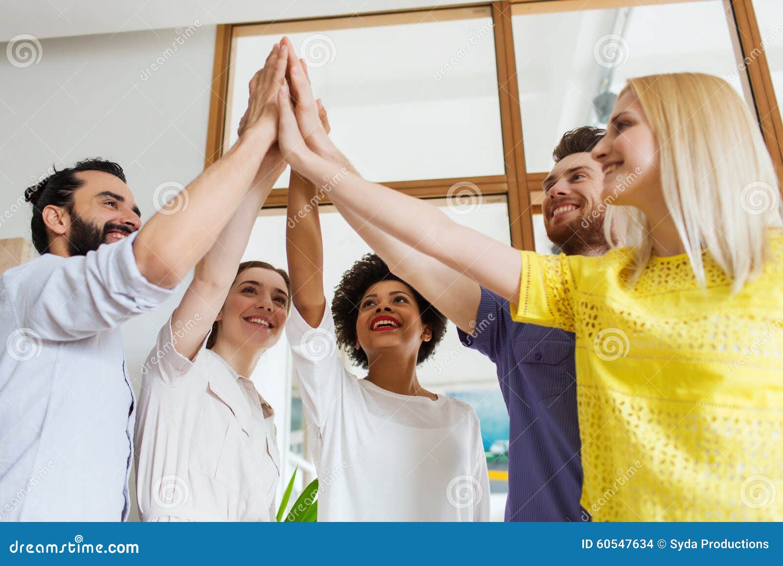 Happy Creative Team in Office Stock Photo - Image of businesswomen ...