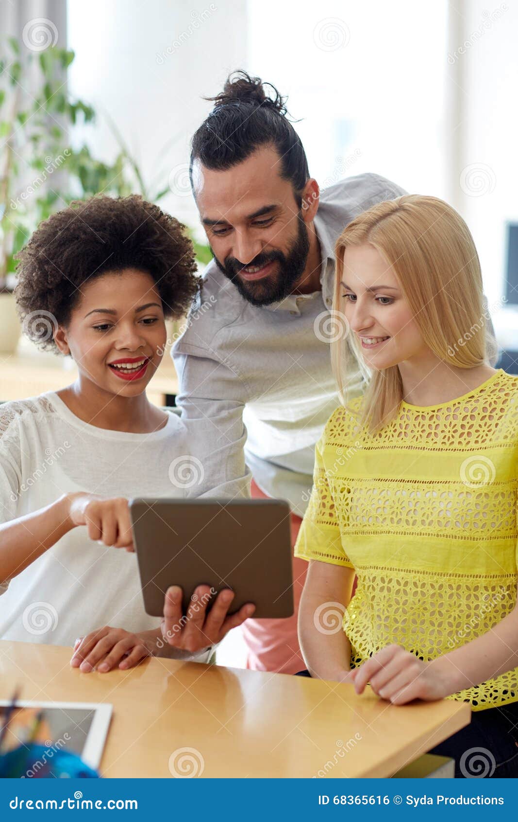 Happy Creative Team with Tablet Pc in Office Stock Photo - Image of ...