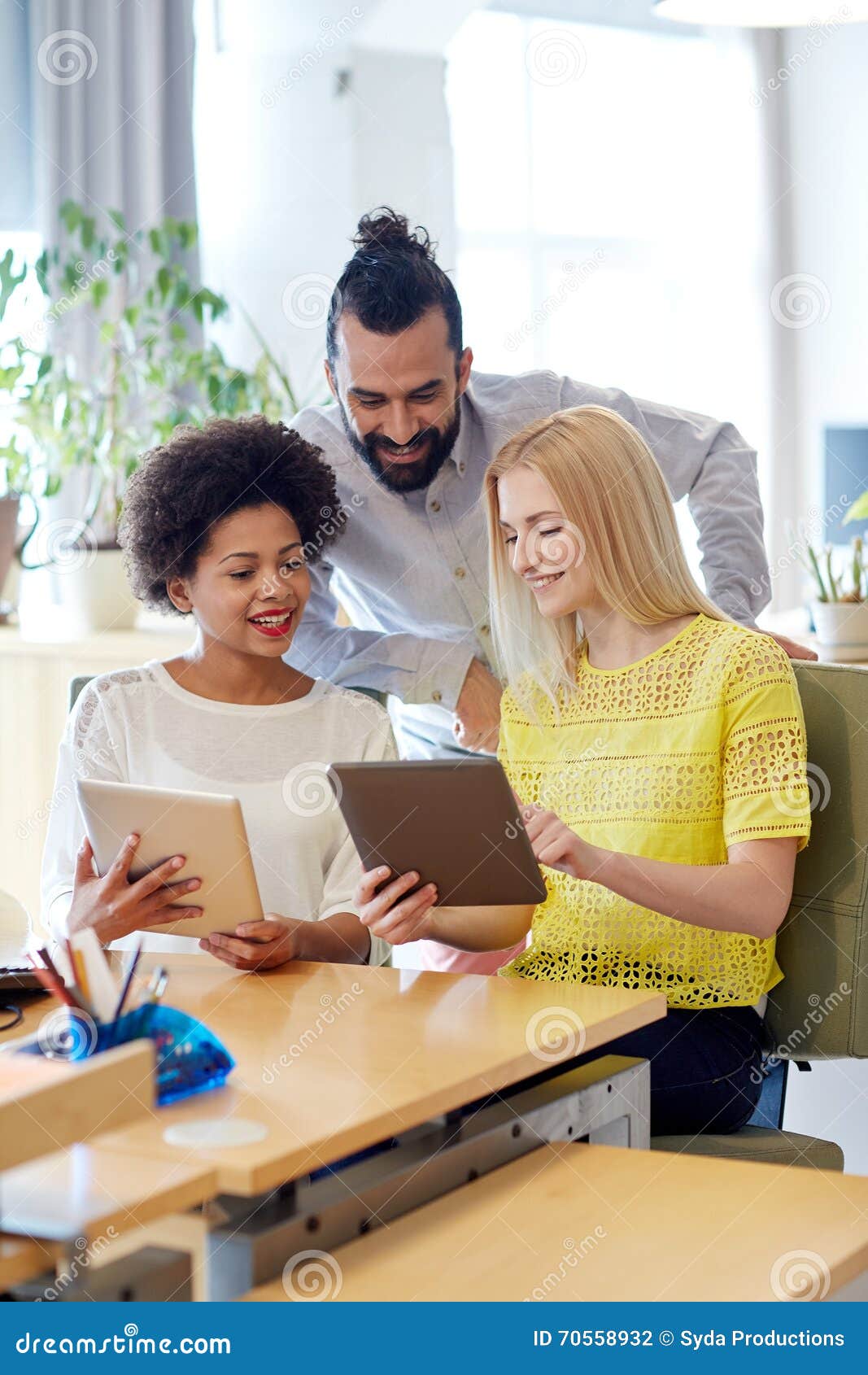 Happy Creative Team with Tablet Pc in Office Stock Photo - Image of ...