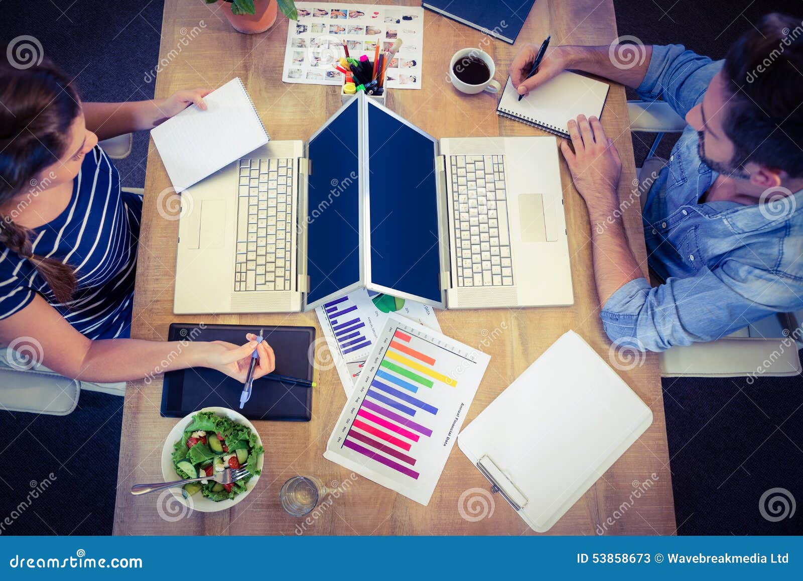 Happy Creative Workers Sharing Desk Stock Image - Image of : 53858673