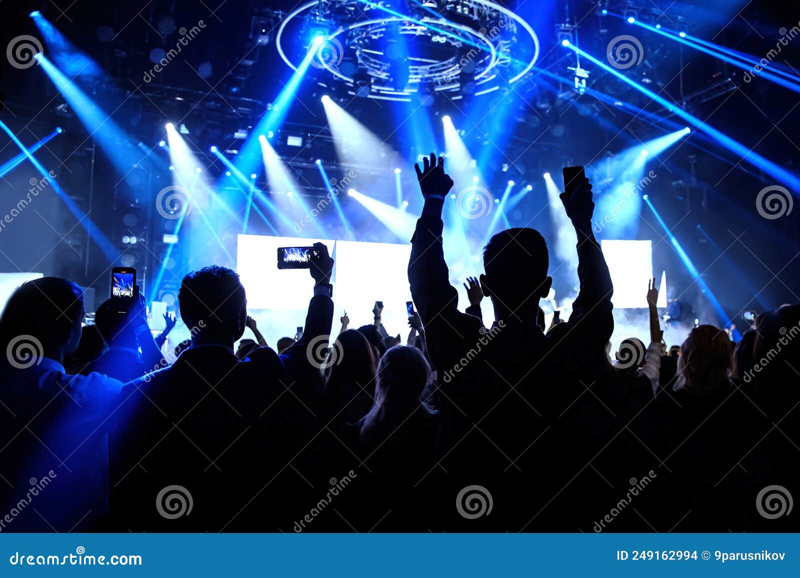 Happy Crowd with Raised Hands at a Rock Concert. Stock Photo - Image of ...