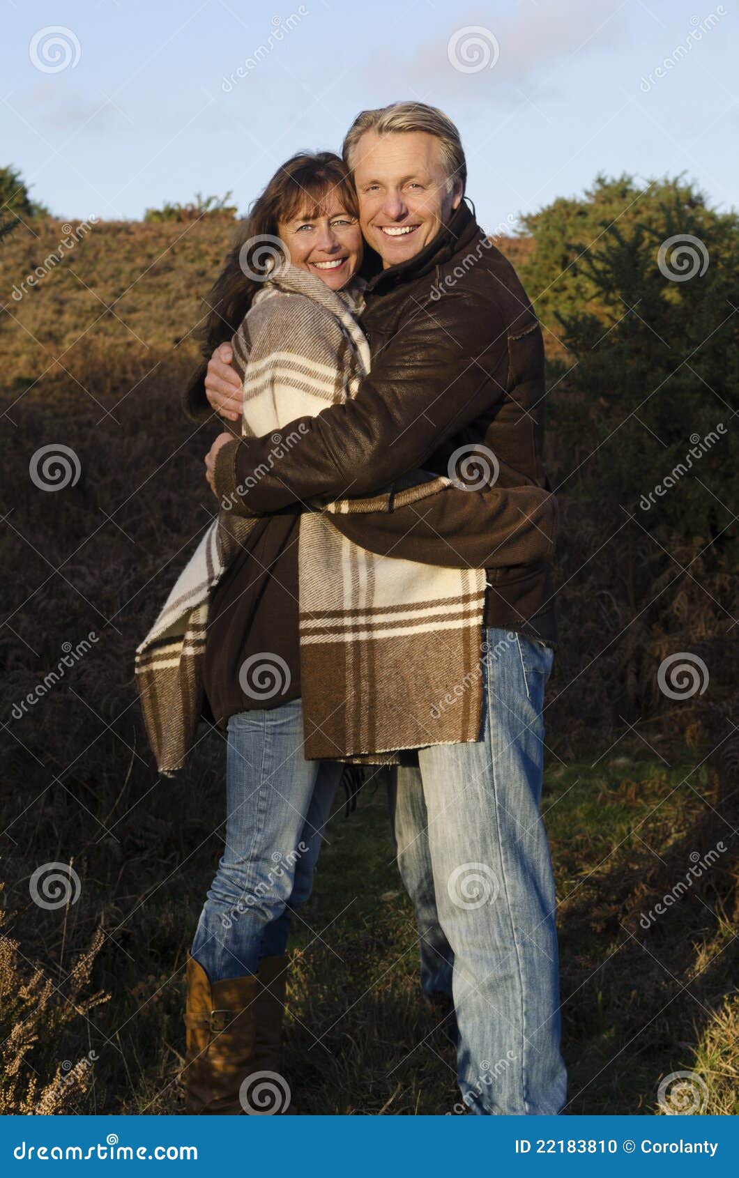 Happy cuddling couple stock photo. Image of smiling, grinning - 22183810