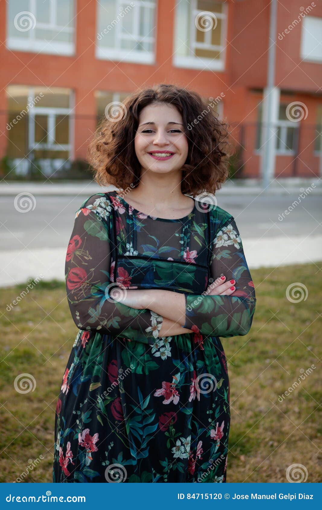 Happy Curvy Girl With Curly Hair In The Street Royalty Free Stock