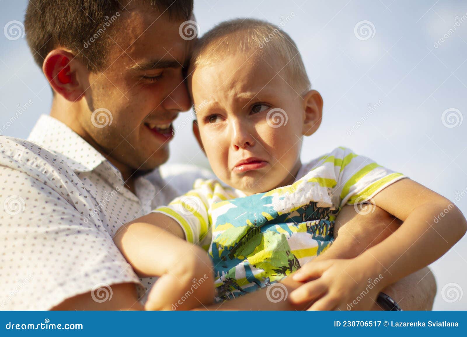Happy Dad Comforts His Little Crying Son Stock Image - Image of infant ...