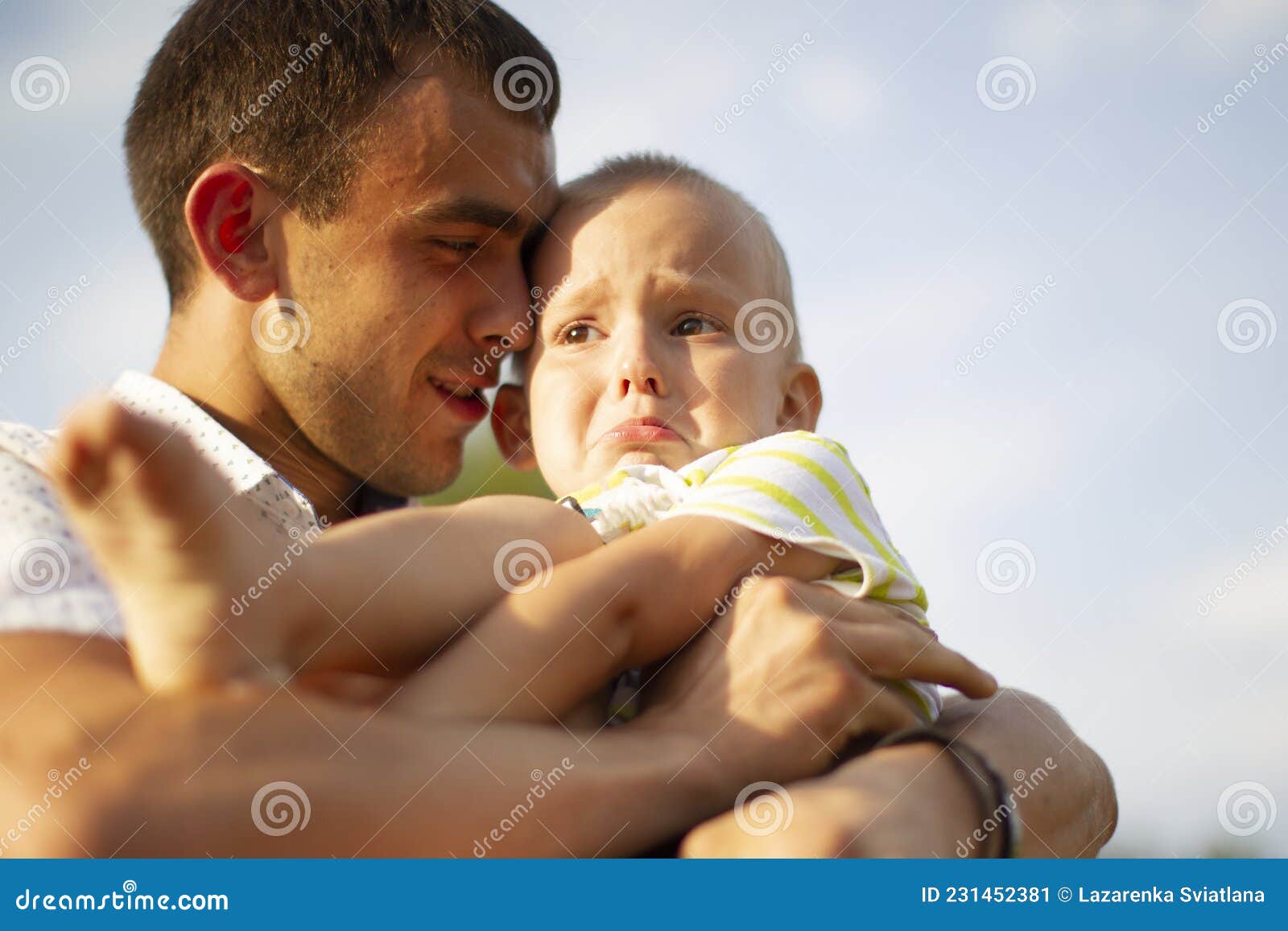 Happy Dad Comforts His Little Crying Son Stock Image - Image of happy ...