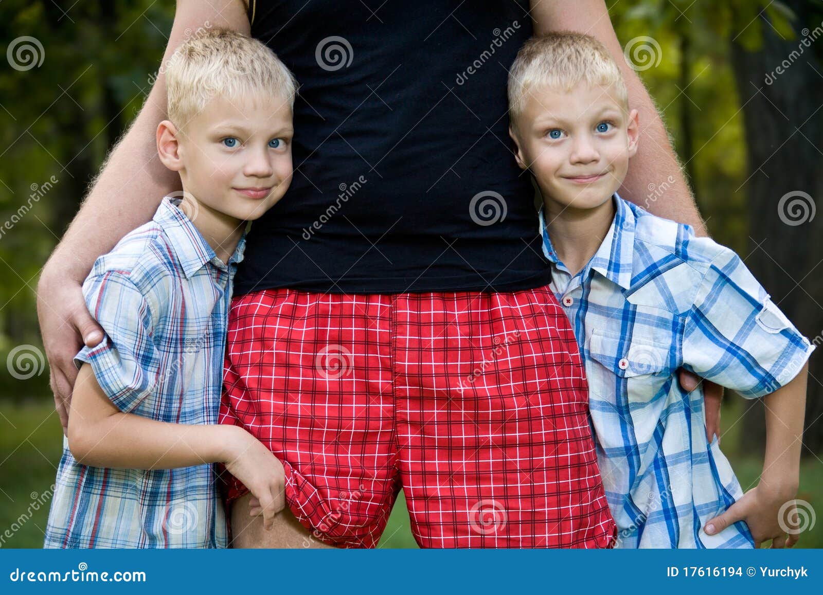 Happy dad with twin boys stock photo. Image of identical - 17616194