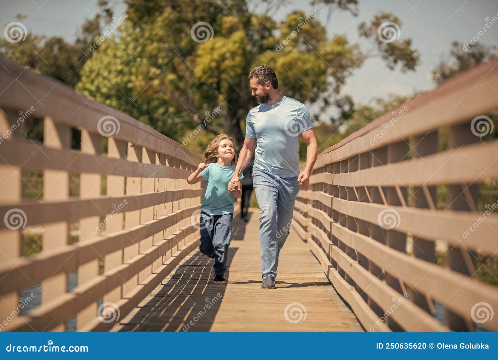 Happy Daddy Having Fun Running with His Son Outdoor, Adoption Stock ...