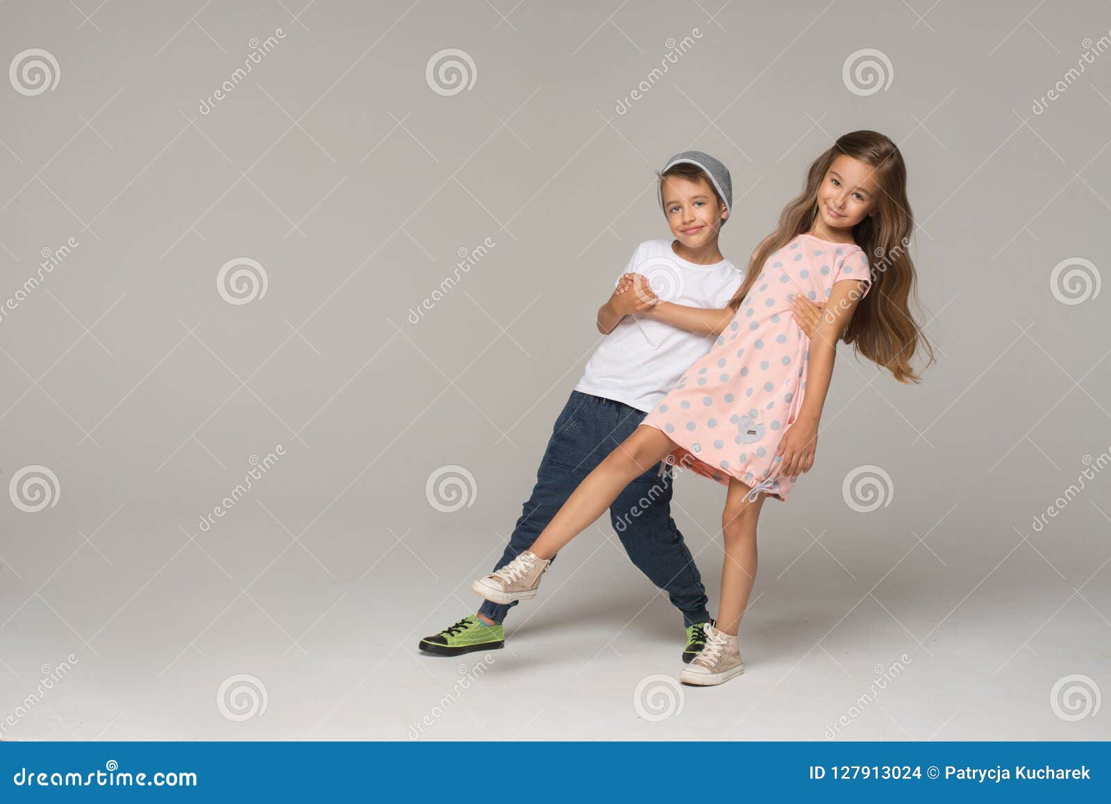 Happy dancing kids. stock photo. Image of female, fashionable - 127913024