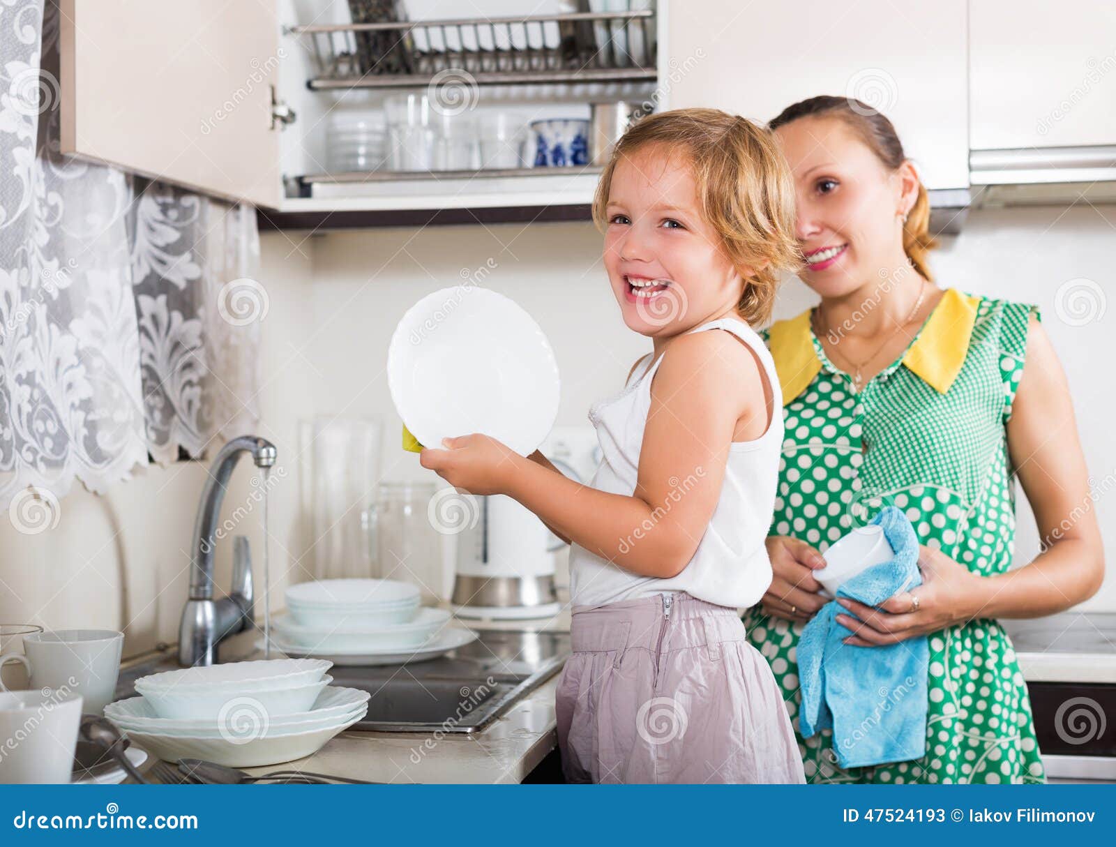 Happy Daughter with Mother Washing Plates Stock Image - Image of ...