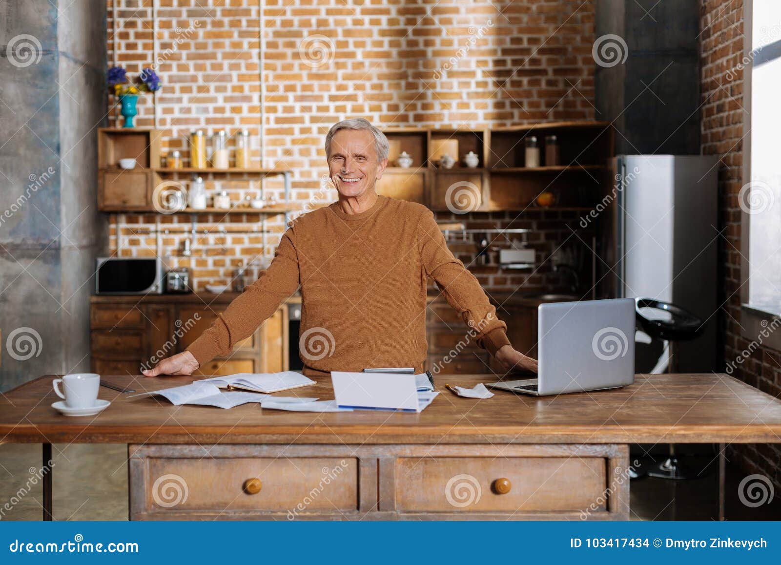 Happy Delighted Man Standing at the Table Stock Photo - Image of ...
