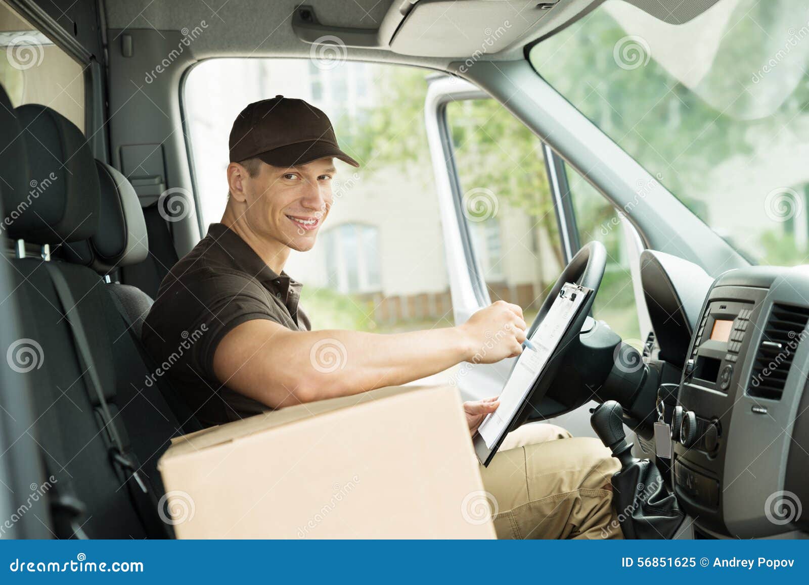 Happy Delivery Man Checking List Stock Image - Image of happy ...