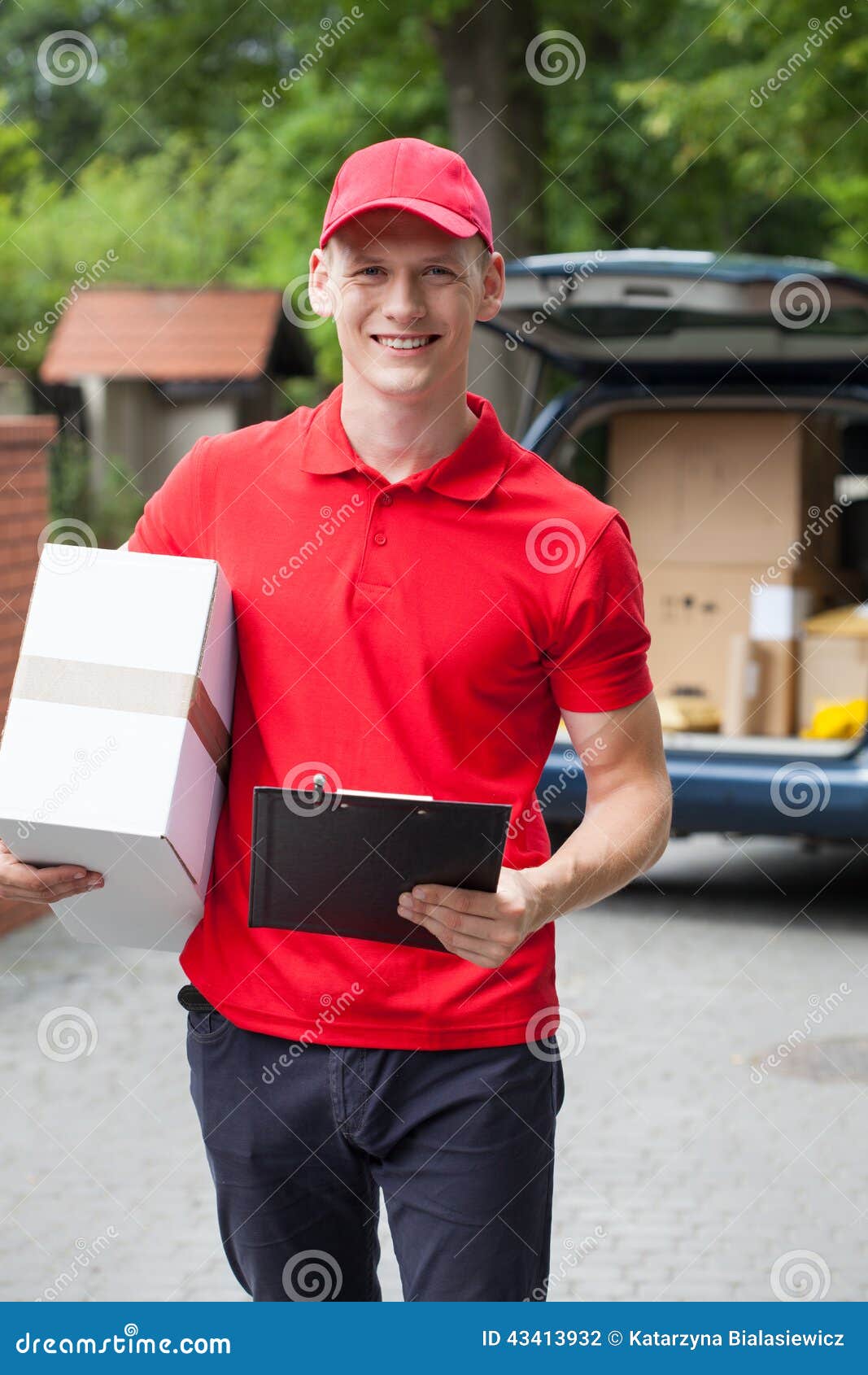 Happy delivery man stock photo. Image of clipboard, portrait - 43413932