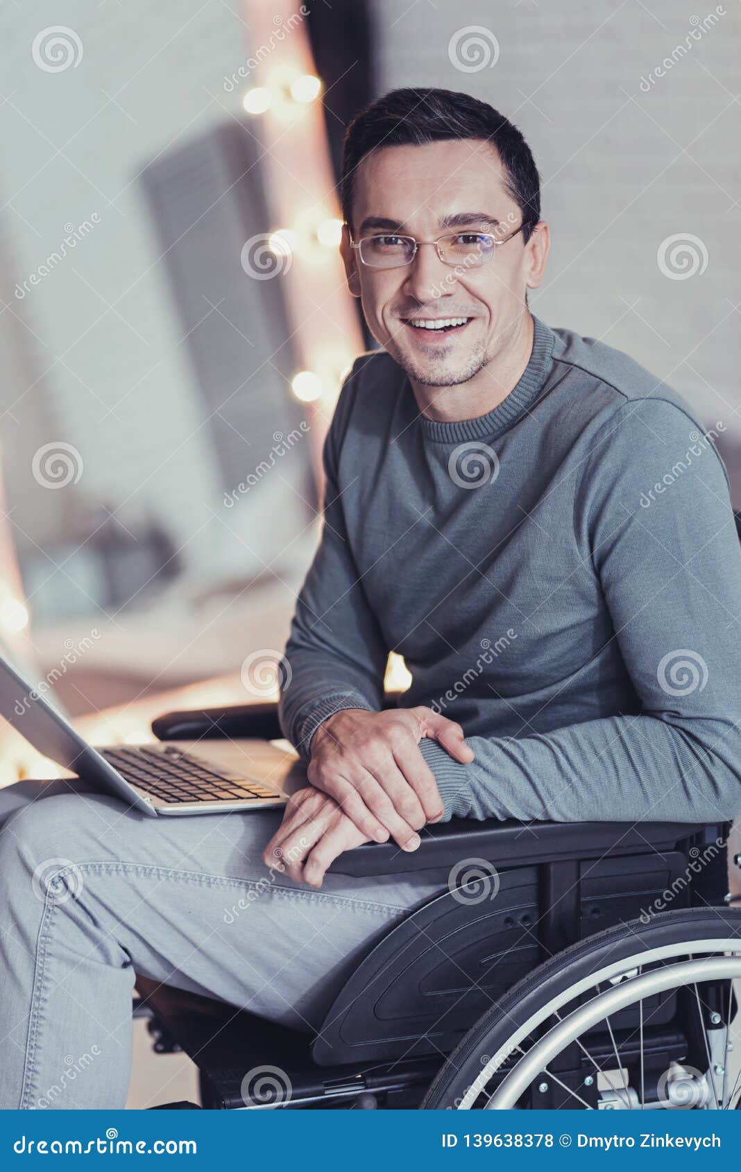 Happy Disabled Man Sitting in Front of His Laptop Stock Photo - Image ...