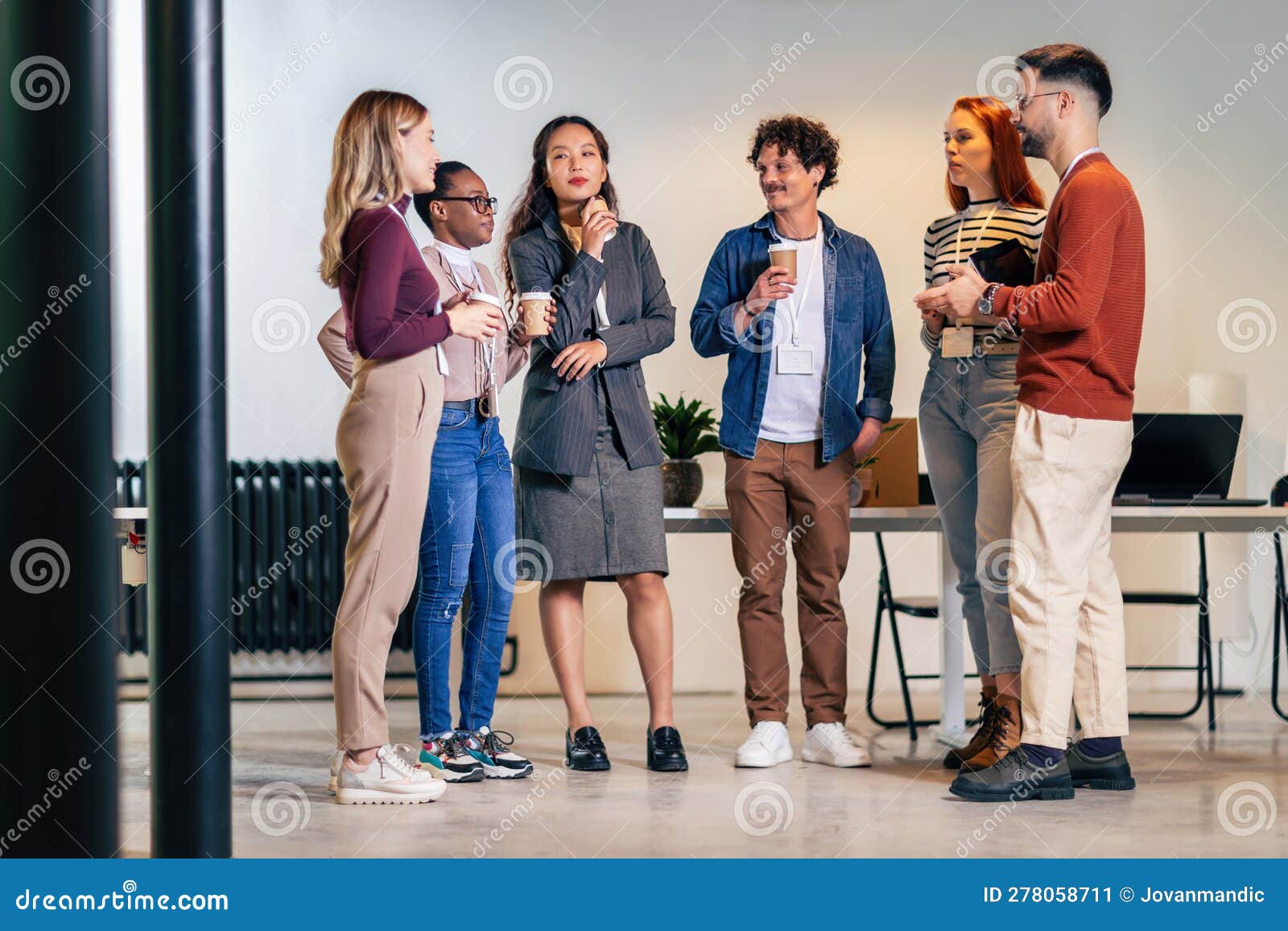 Diverse Colleagues Have Fun At Lunch Break In Office Smiling