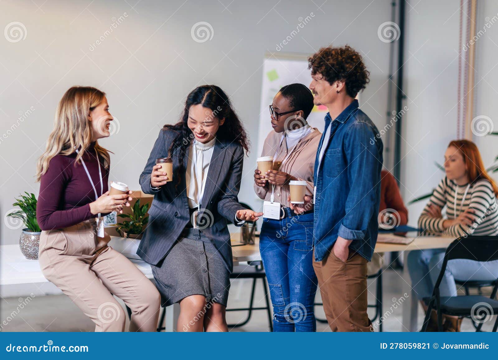Diverse Colleagues Have Fun At Lunch Break In Office Smiling