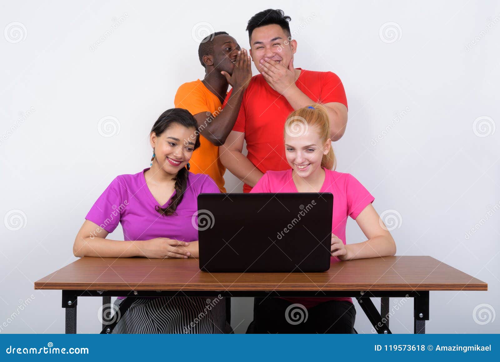 Happy Diverse Group of Multi Ethnic Friends Smiling while Using Stock ...