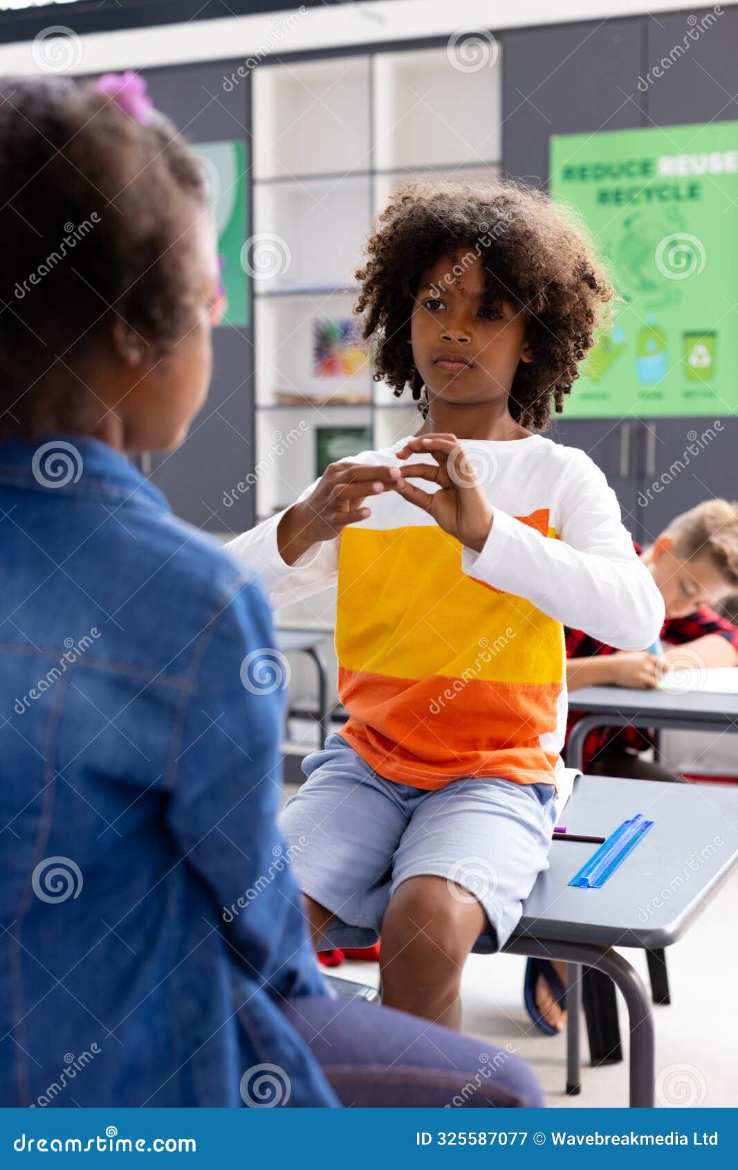Happy Diverse Schoolchildren Using Sign Language in School Classroom ...