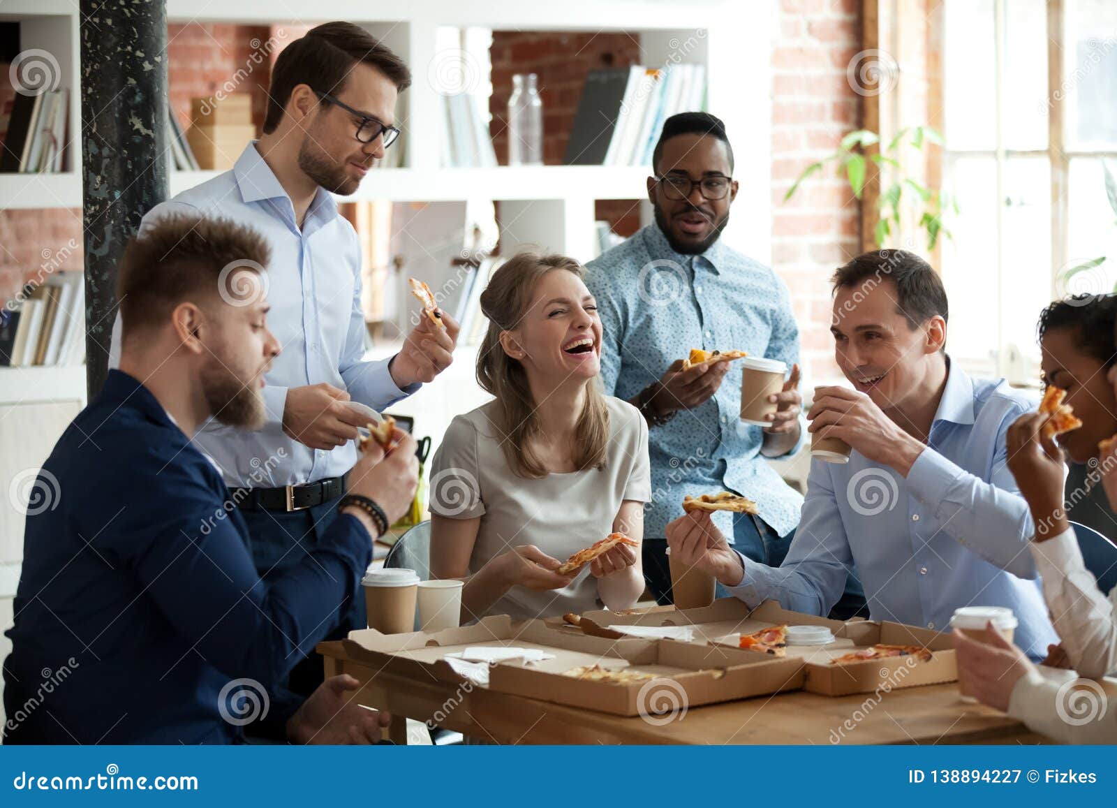 Happy Diverse Team People Talking Laughing Eating Pizza in Office Stock ... Happy Diverse Team People Talking Laughing Eating Pizza in Office Stock ...