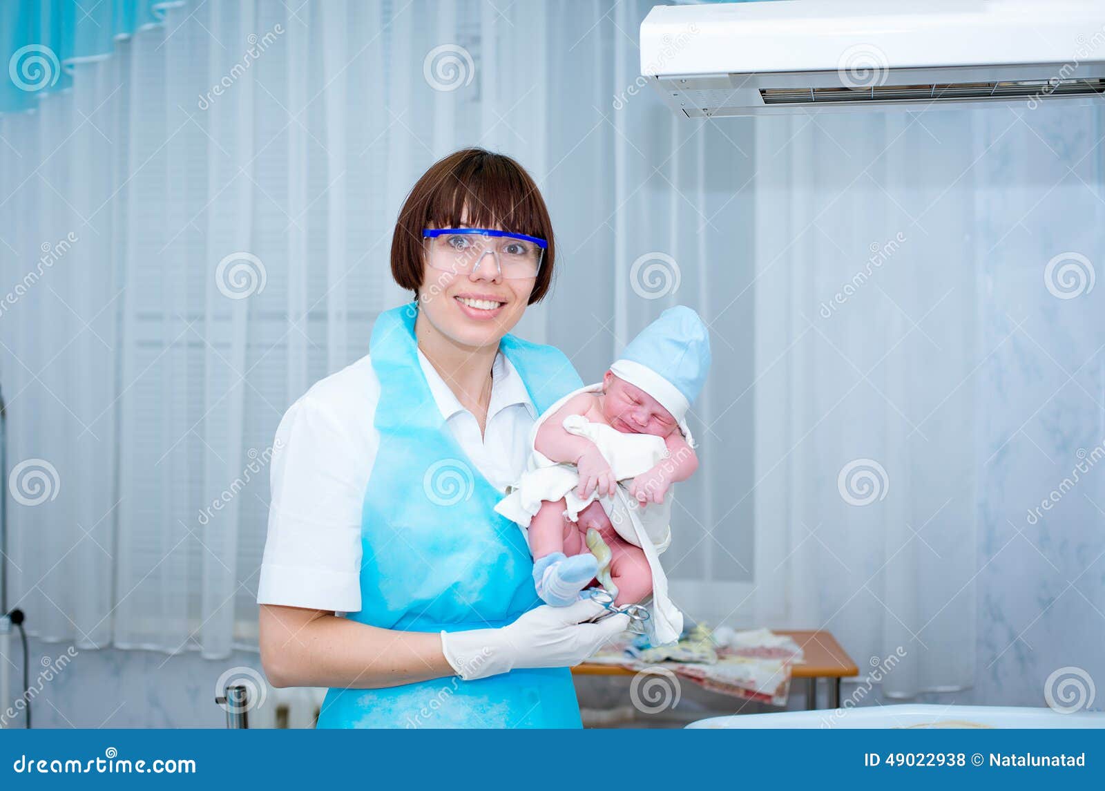 Happy Doctor with a Baby in Her Arms Stock Photo - Image of midwife ...